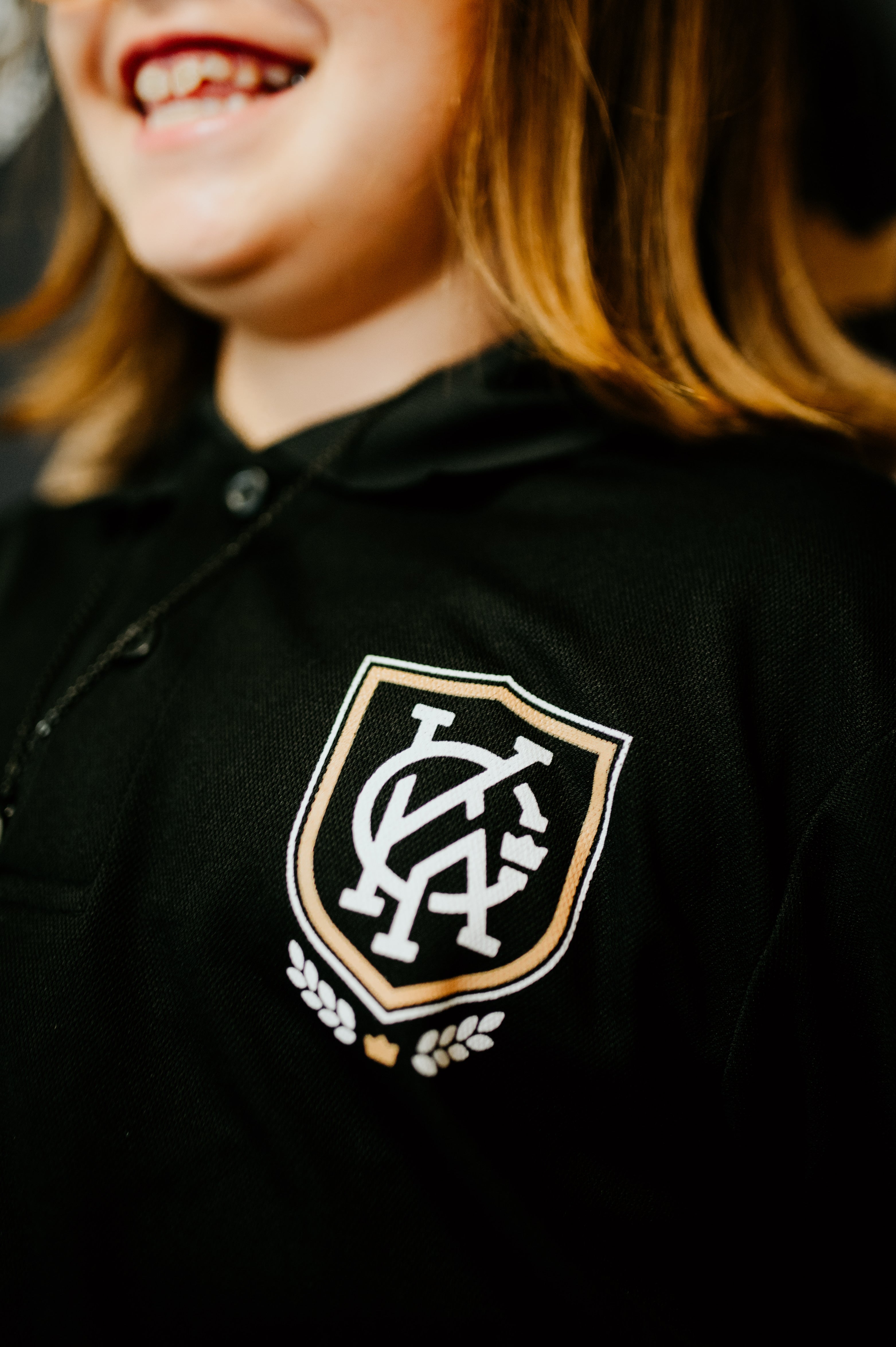 Black/White Polos – Kingdom Culture Academy Uniform Store